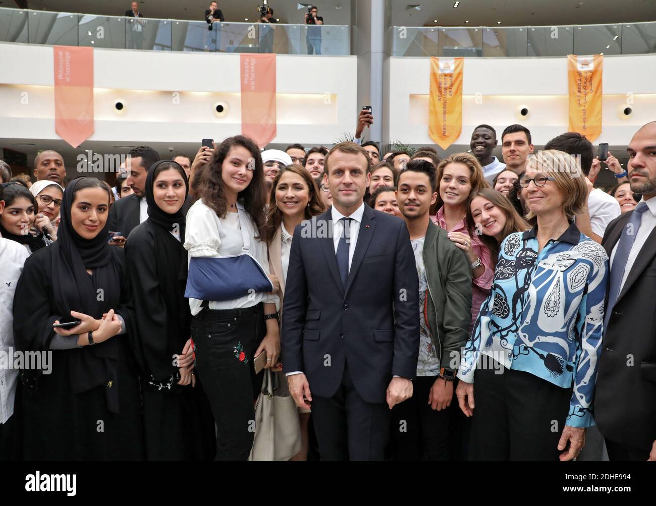 French President Emmanuel Macron poses for selfies with students during ...