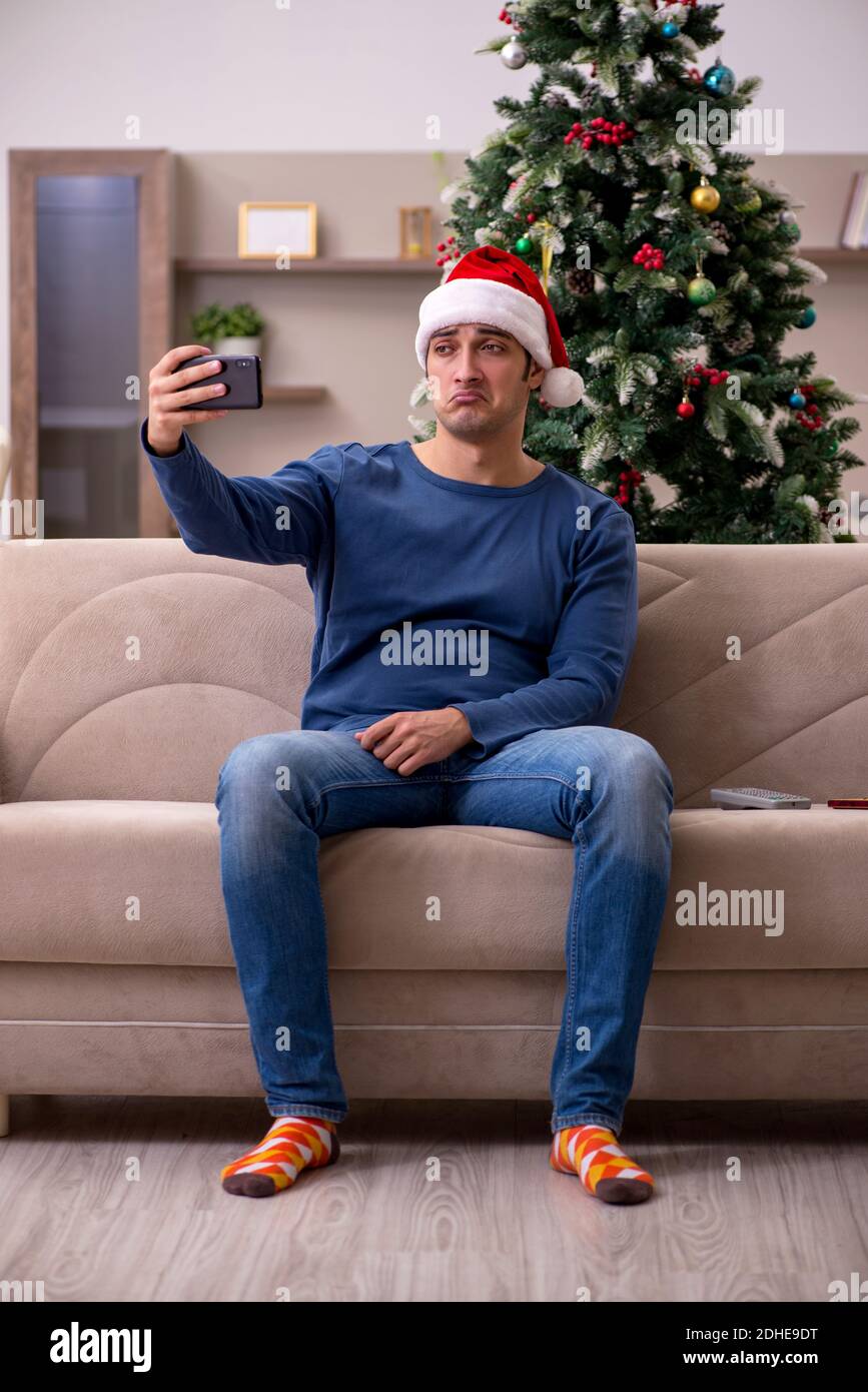 Christmas decorating alone sad hi-res stock photography and images - Alamy