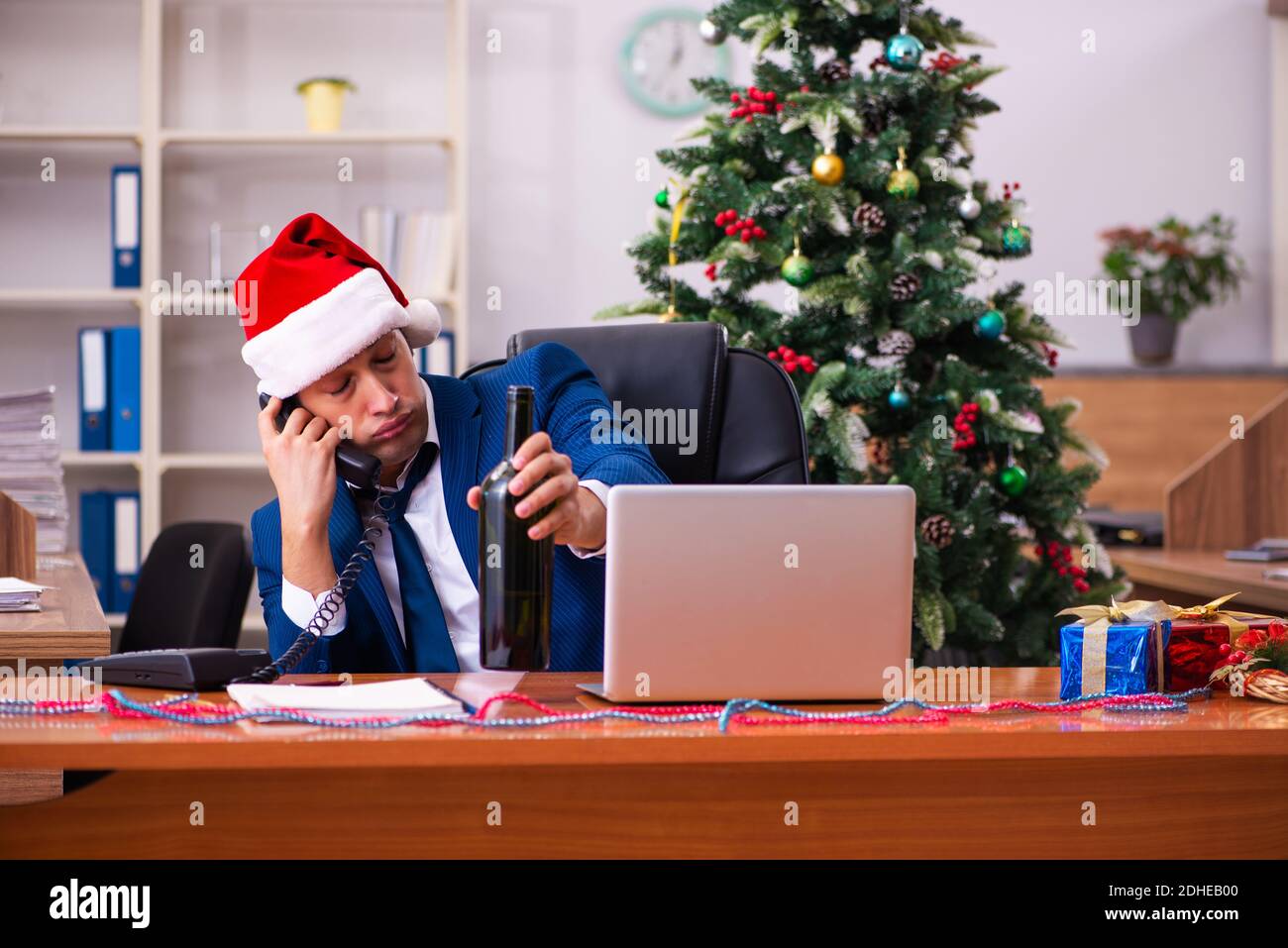 Employee in the office during christmas party Stock Photo - Alamy