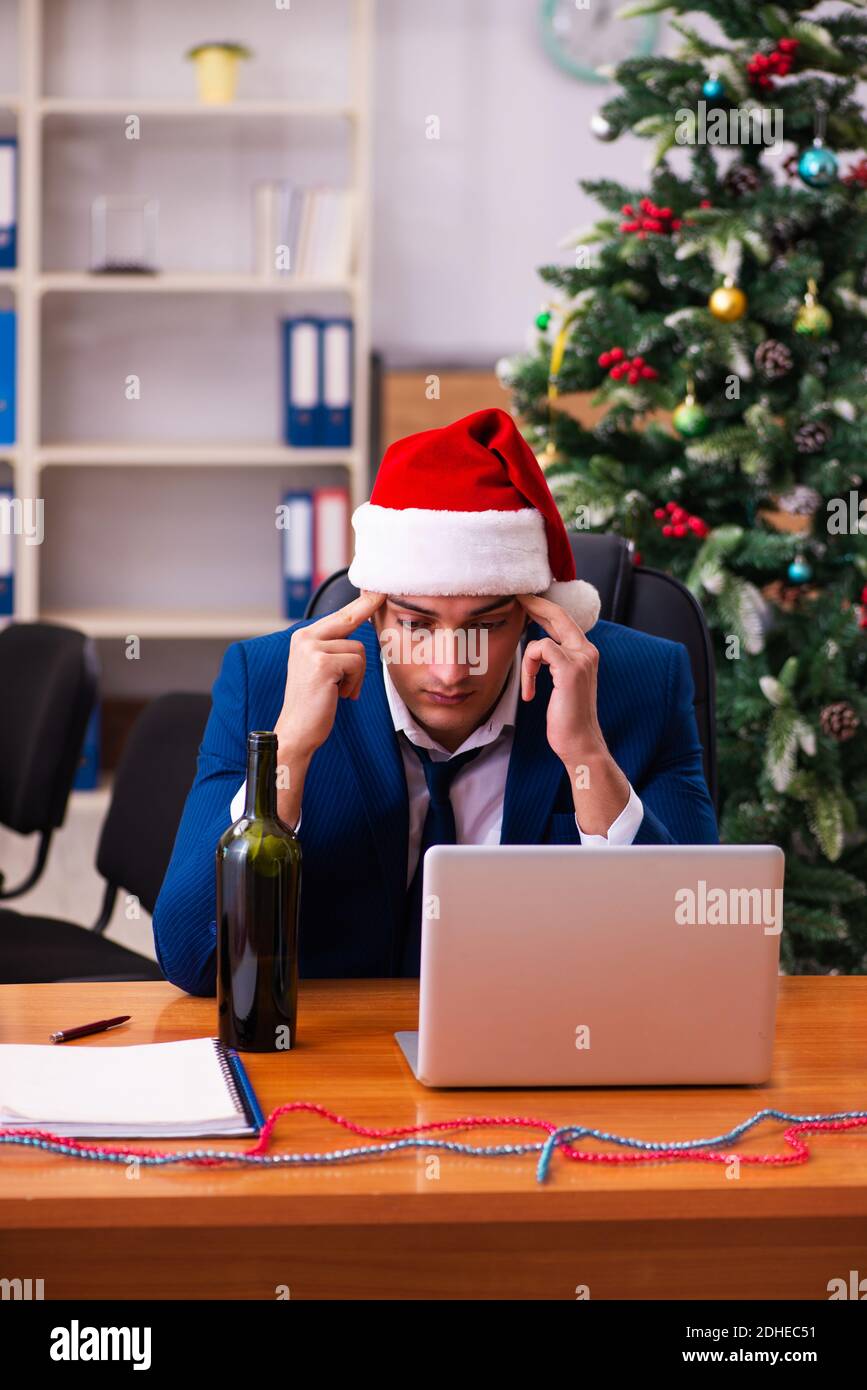 Employee in the office during christmas party Stock Photo - Alamy
