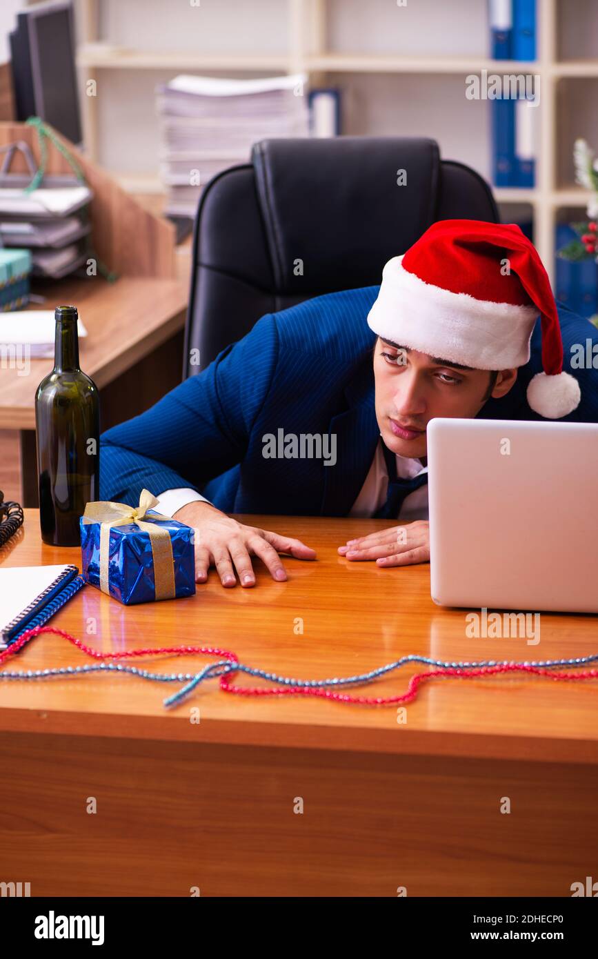 Employee in the office during christmas party Stock Photo - Alamy