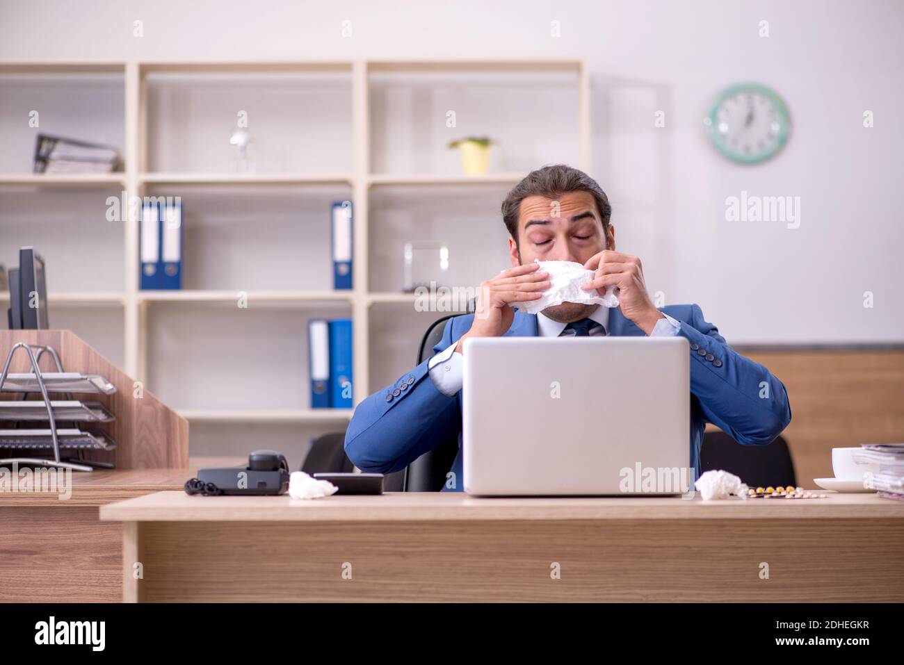 Sick young businessman coughing throat hi-res stock photography and ...