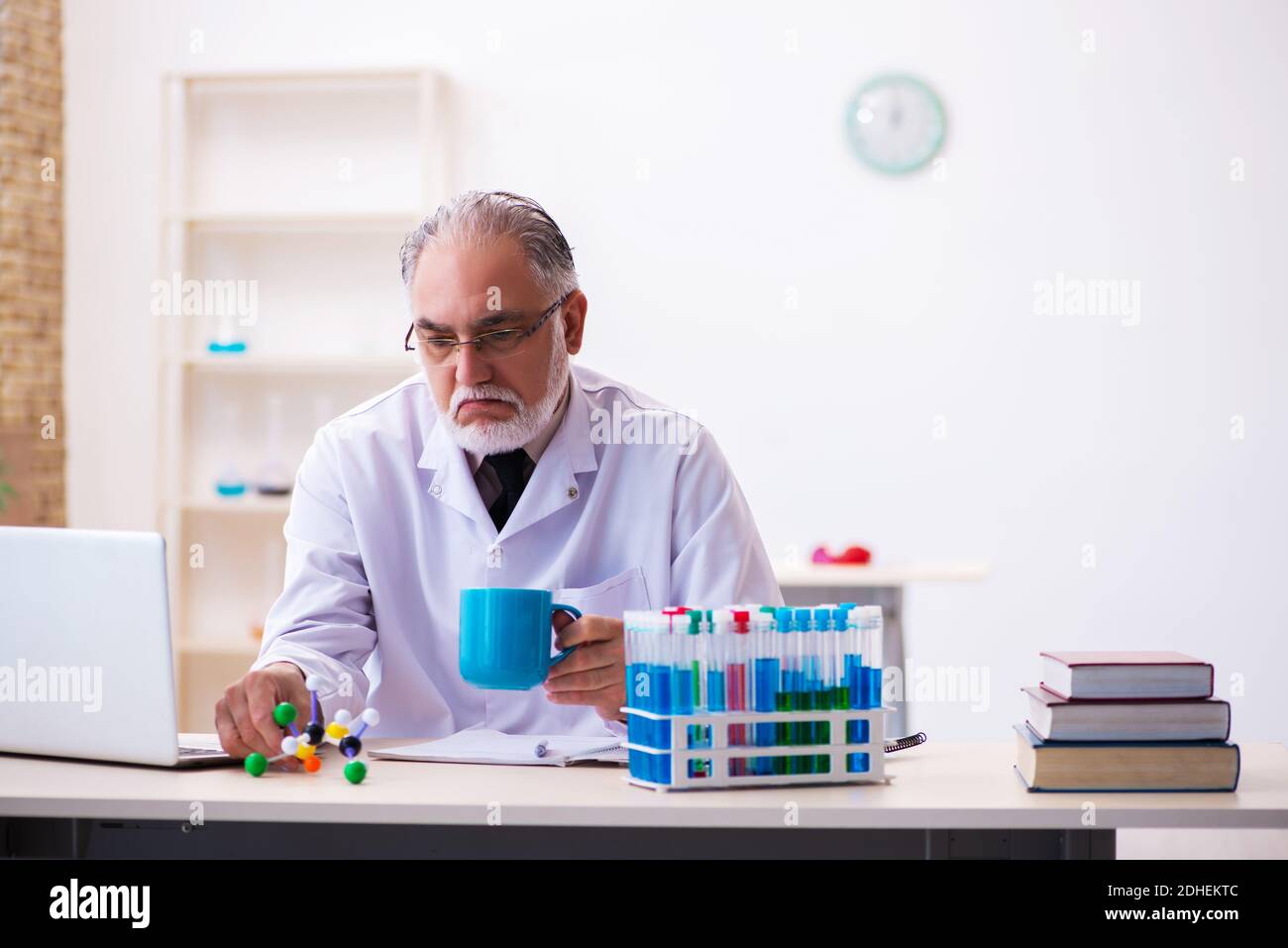 Experienced old scientist working hi-res stock photography and images ...