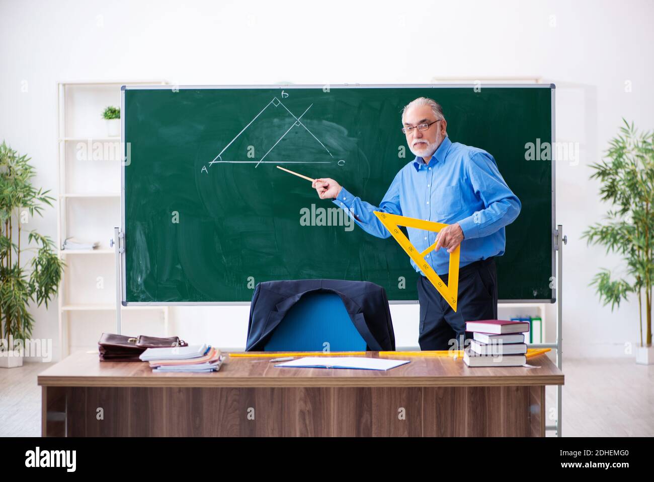 Old school teacher ruler hi-res stock photography and images - Alamy