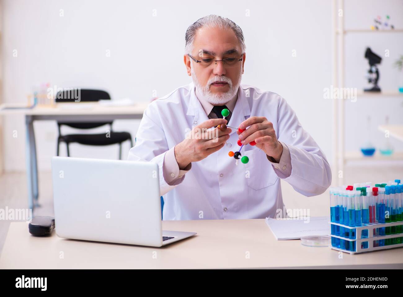 Experienced old scientist working hi-res stock photography and images ...