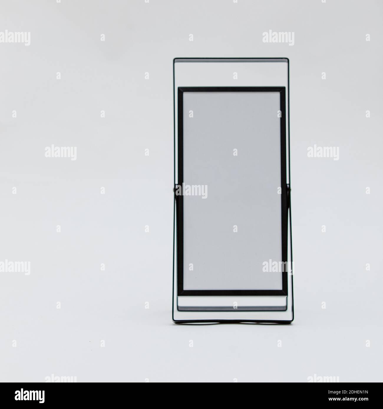 A vertical photo frame on a gray background Stock Photo - Alamy