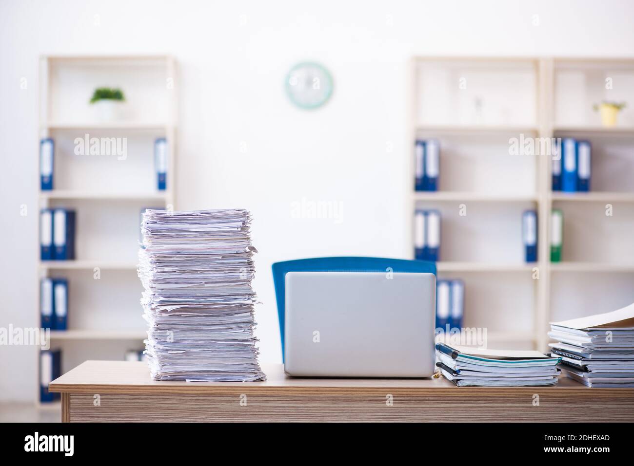 Nobody and a lot of papers on the desk in the office Stock Photo - Alamy