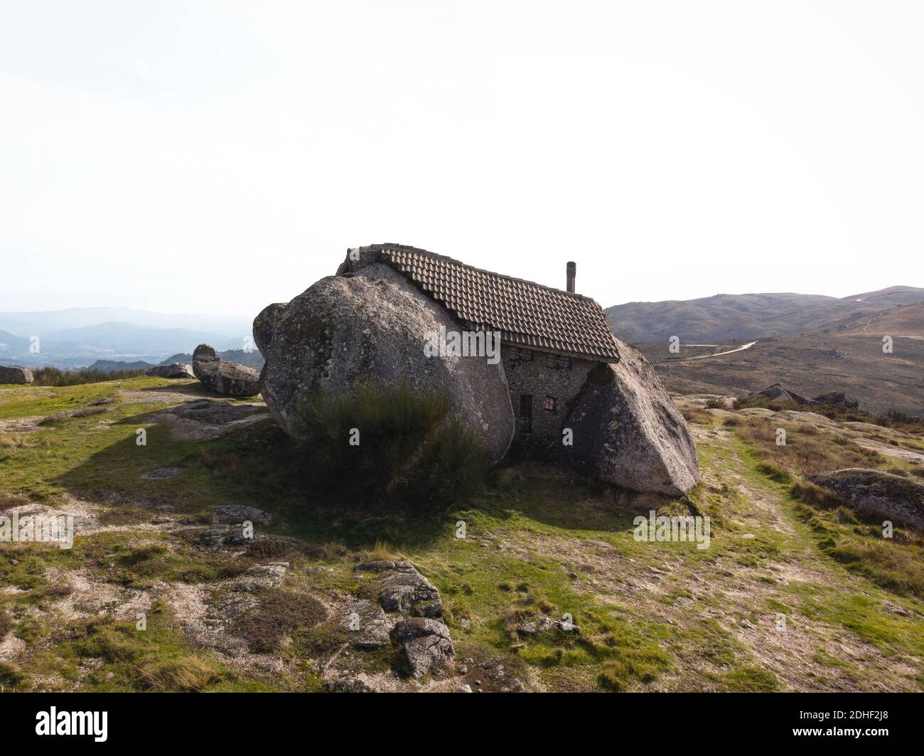 House between rocks portugal hi-res stock photography and images - Alamy