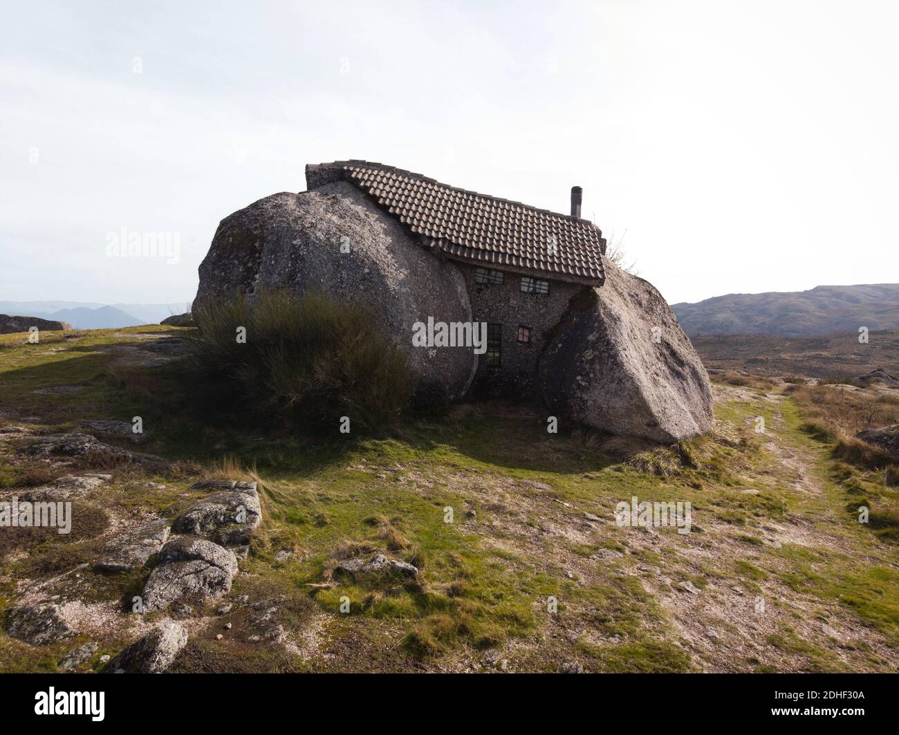 House between rocks portugal hi-res stock photography and images - Alamy