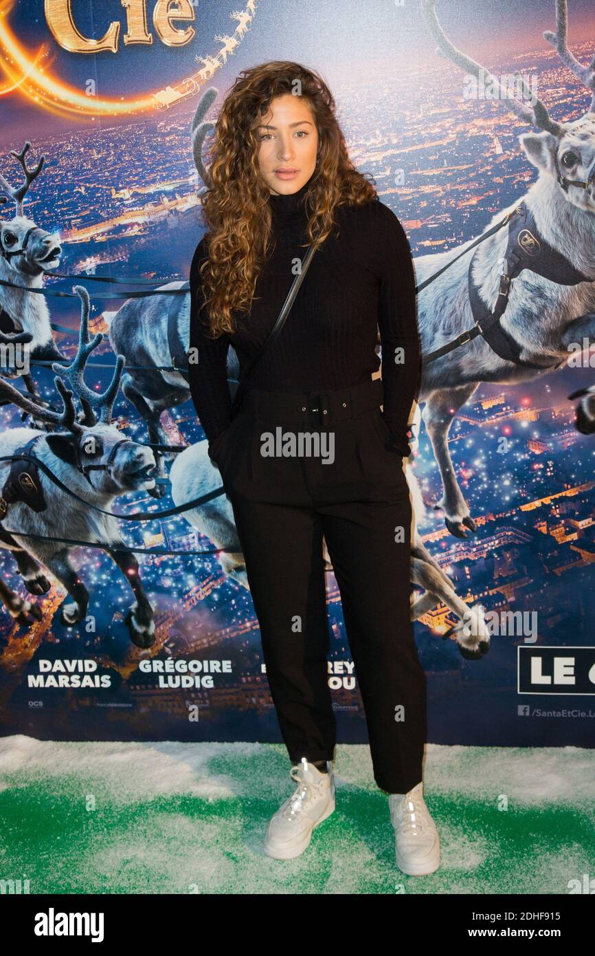 Manon Azem arriving at 'Santa & Cie' Paris film premiere at Pathe ...