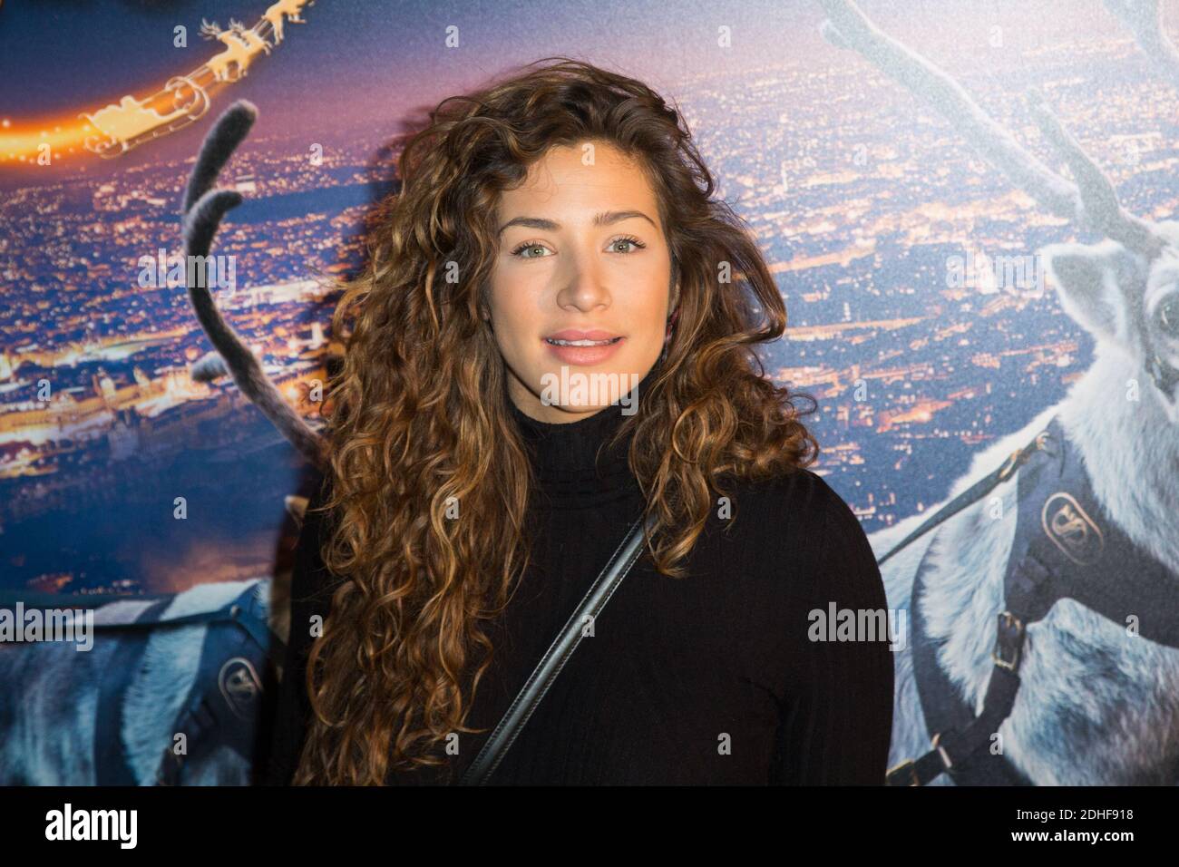 Manon Azem arriving at 'Santa & Cie' Paris film premiere at Pathe ...