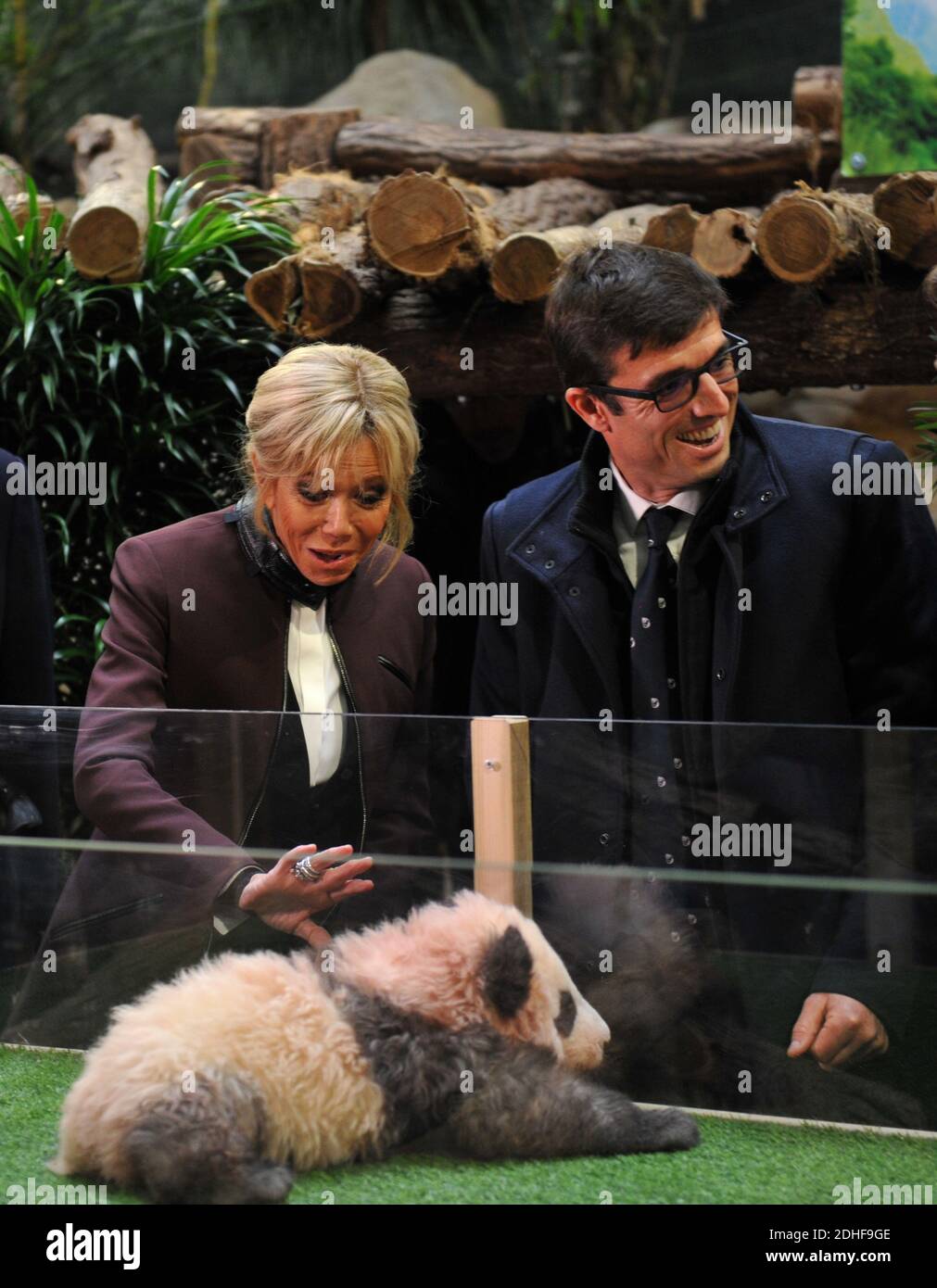 French President wife's Brigitte Macron (R) flanked by founder of the ...