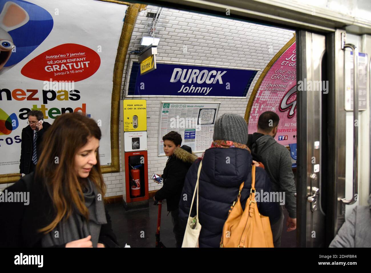Commuters pass by the Duroc metro station which was renamed Durock ...