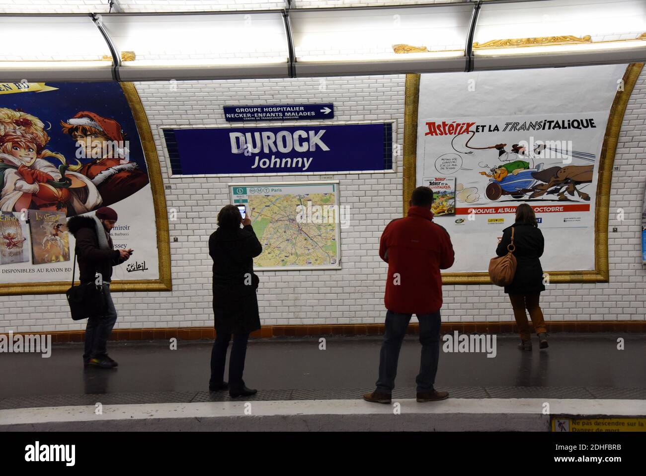 Commuters pass by the Duroc metro station which was renamed Durock ...