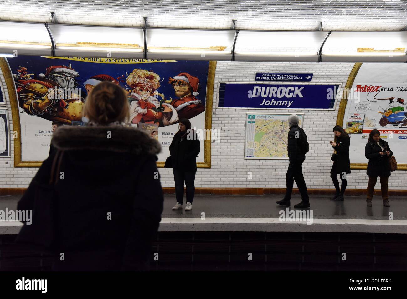 Commuters pass by the Duroc metro station which was renamed Durock ...
