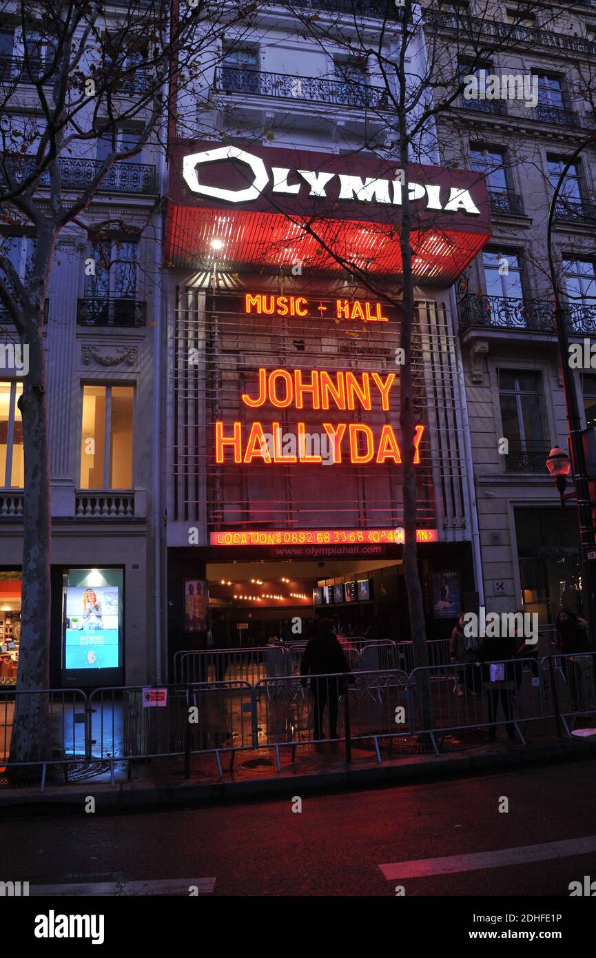 The Olympia Concert Hall is lit up with the name of Johnny Hallyday in ...