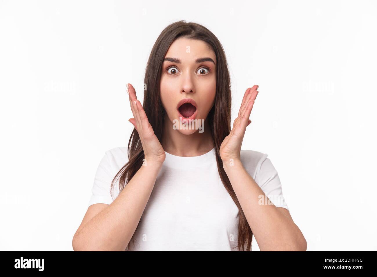 What an amazing news. Surprised and astonished, excited young woman ...