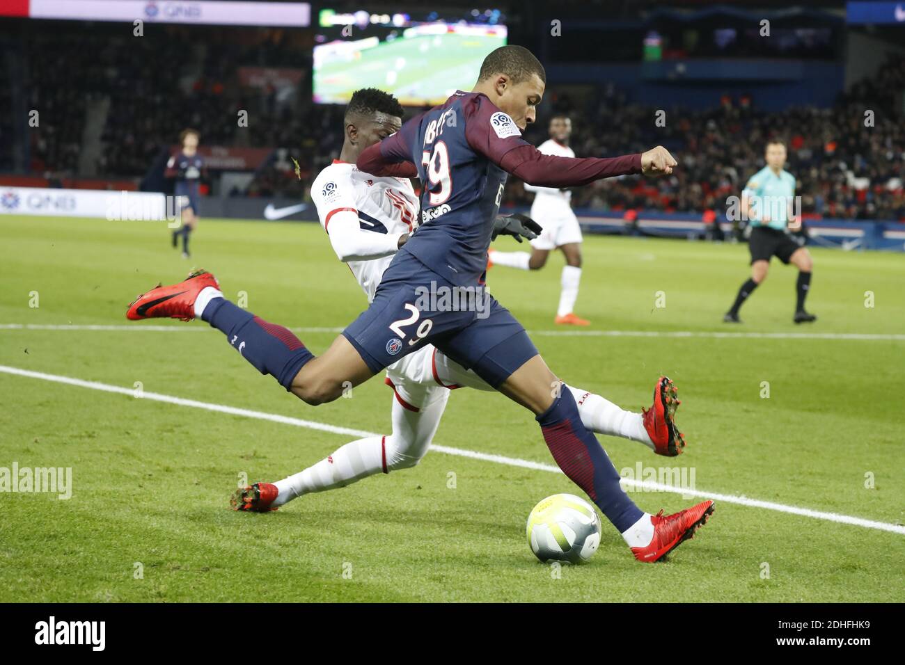 PSG's Kylian Mbappe battling Lille's Edgar Ie during the French Ligue 1 ...