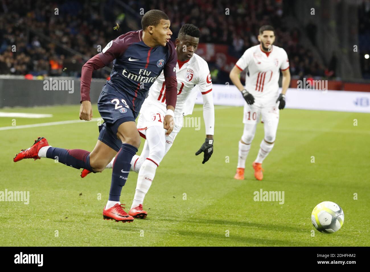 PSG's Kylian Mbappe battling Lille's Edgar Ie during the French Ligue 1 ...