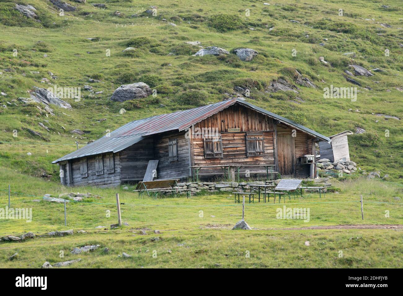 A small hut in the mountains Stock Photo - Alamy