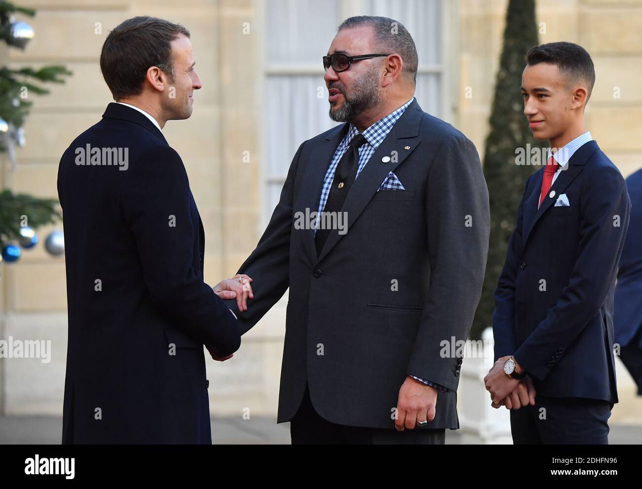 French President Emmanuel Macron greets King of Morocco Mohammed VI and ...