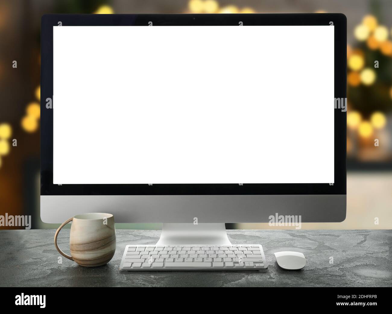 Modern PC monitor with blank screen on table indoors Stock Photo - Alamy