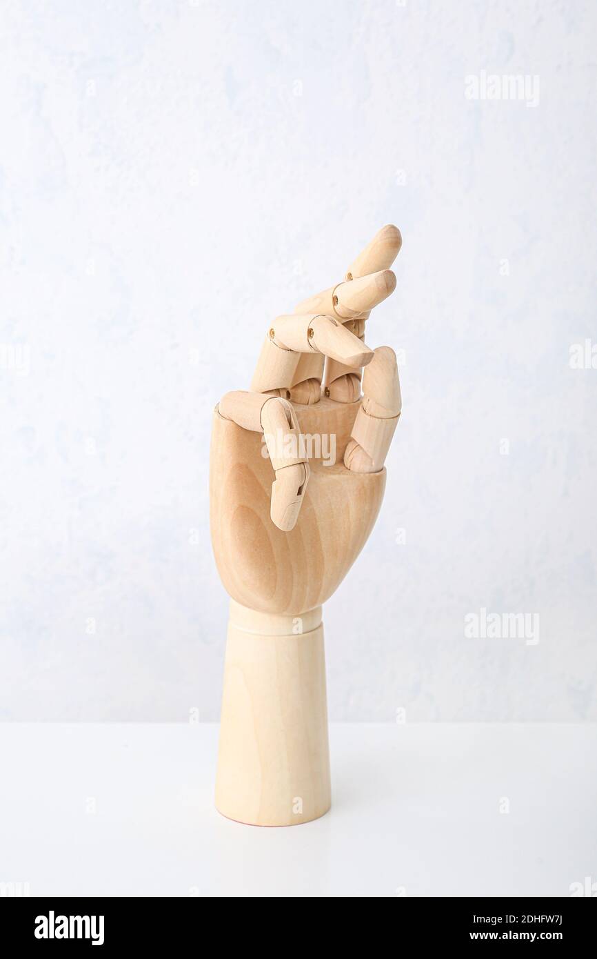 Wooden hand isolated on white background Stock Photo - Alamy