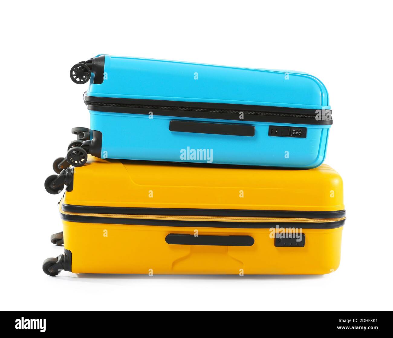 Packed suitcases on white background Stock Photo - Alamy