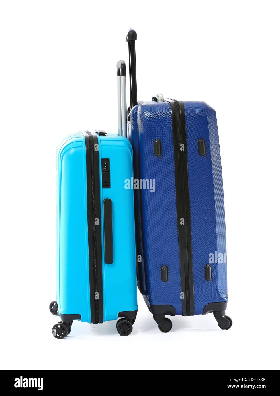 Packed suitcases on white background Stock Photo - Alamy