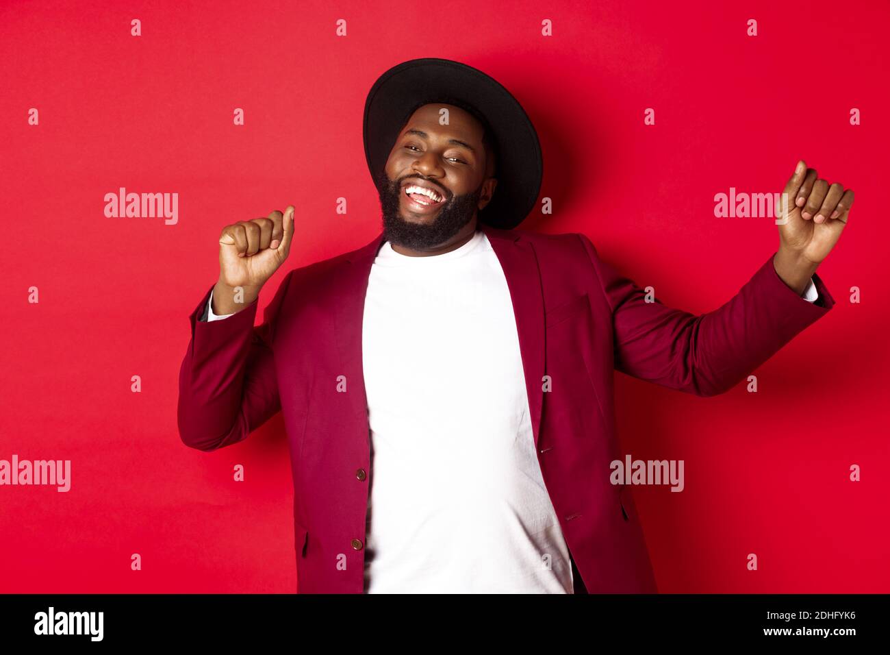 Christmas and people concept. Happy Black man celebrating New Year and ...