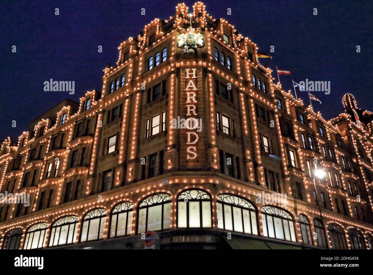 London, UK. 10th Dec, 2020. The iconic facade of Harrods all lit up ...