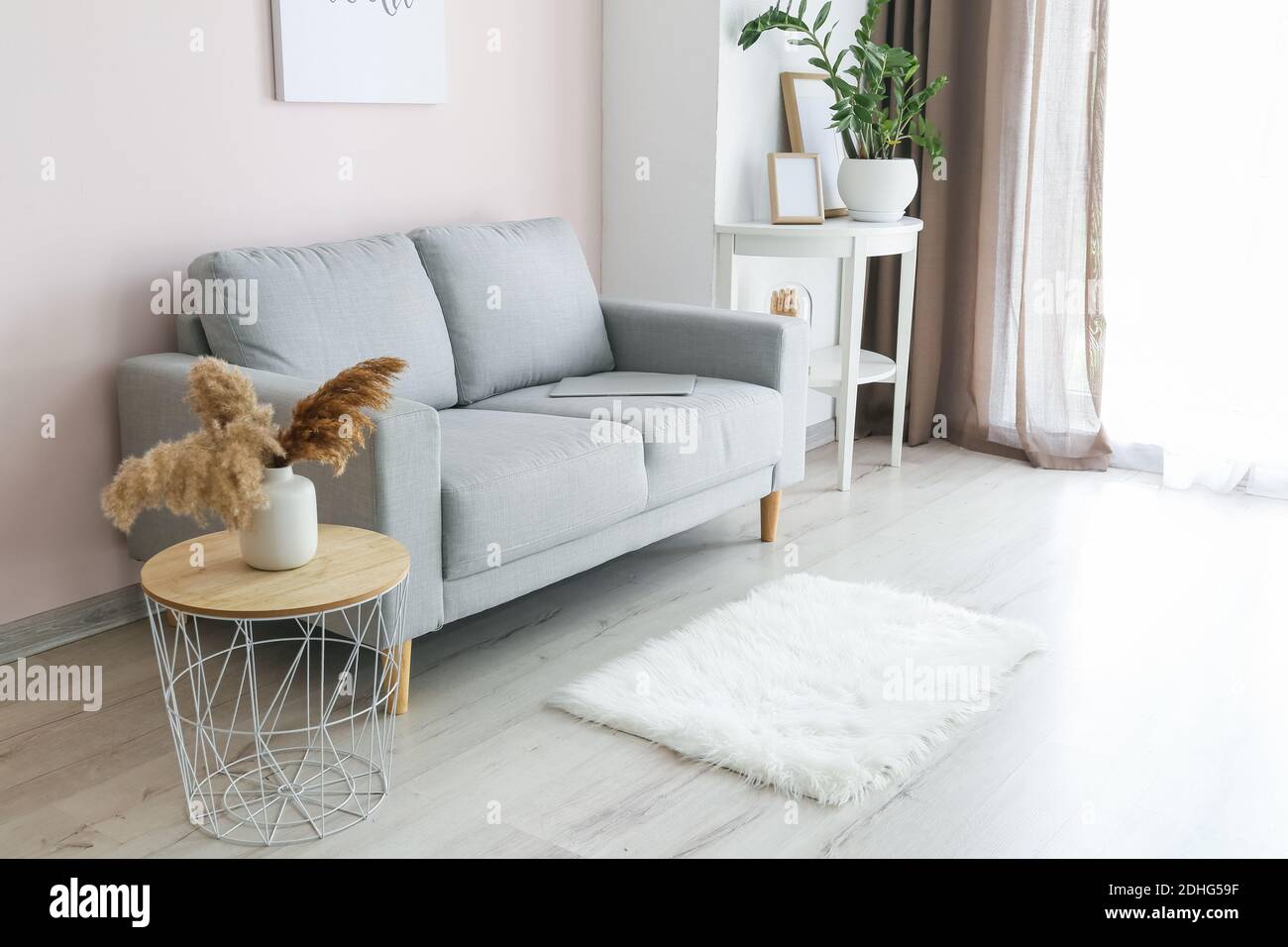 Interior of modern room with sofa Stock Photo - Alamy