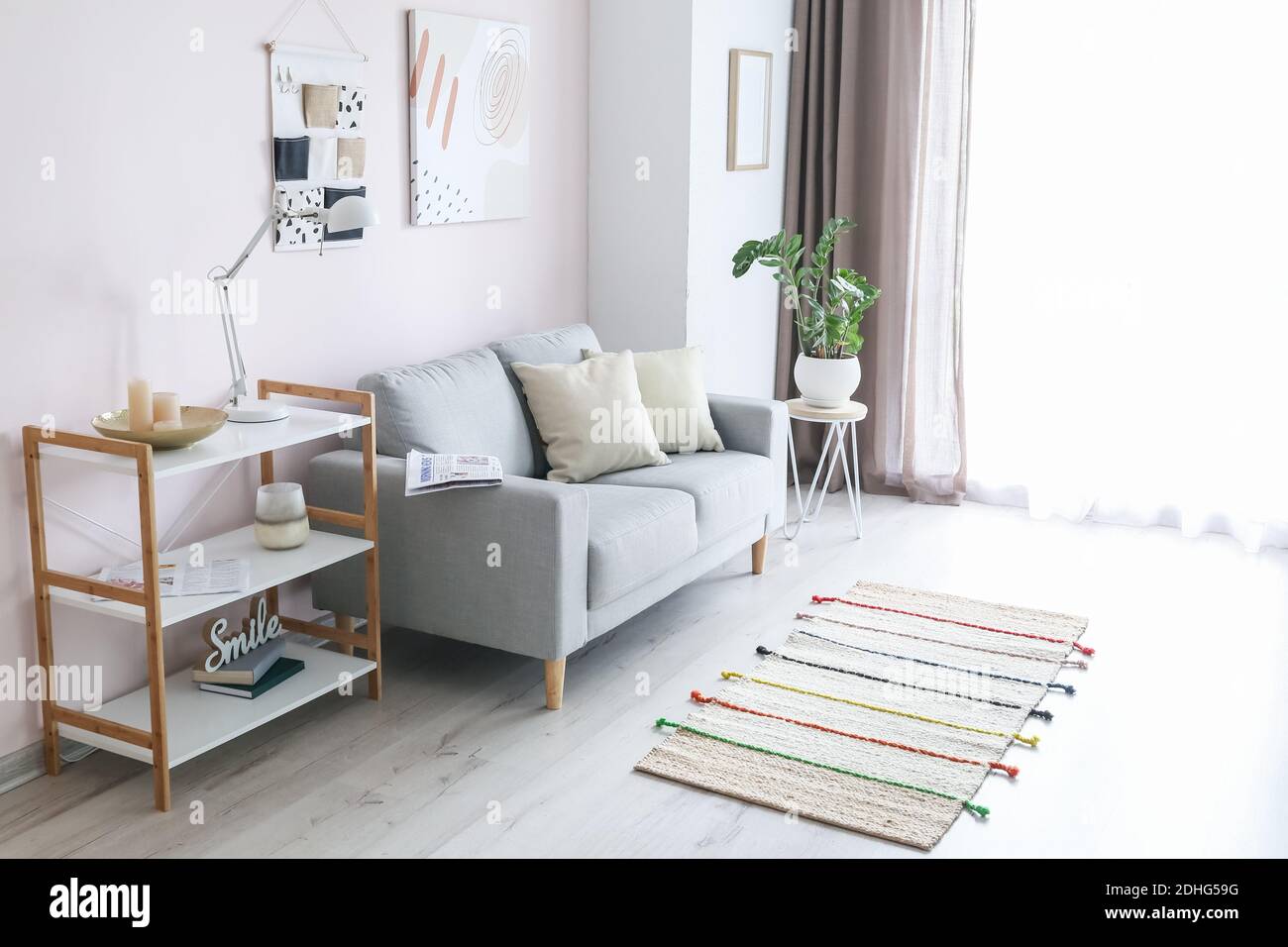 Interior of modern room with sofa Stock Photo - Alamy
