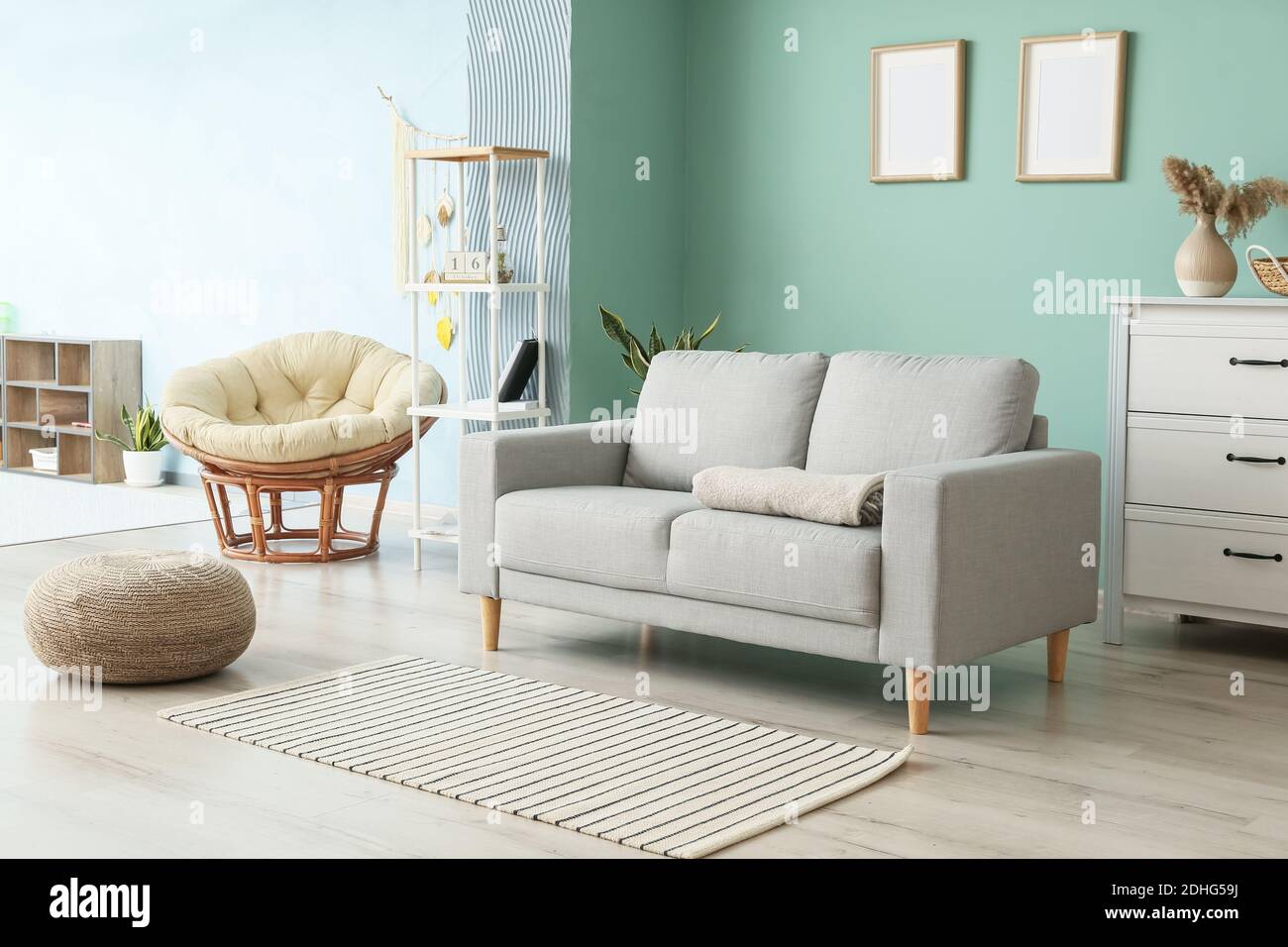 Interior of modern room with sofa Stock Photo - Alamy