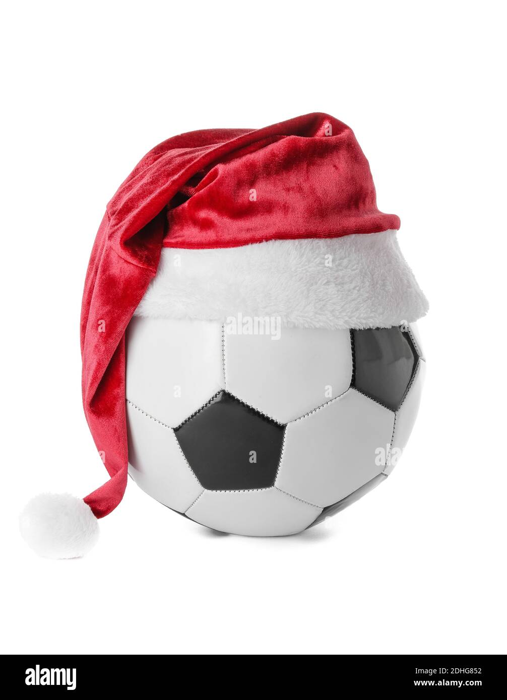 Santa hat with soccer ball on white background Stock Photo - Alamy
