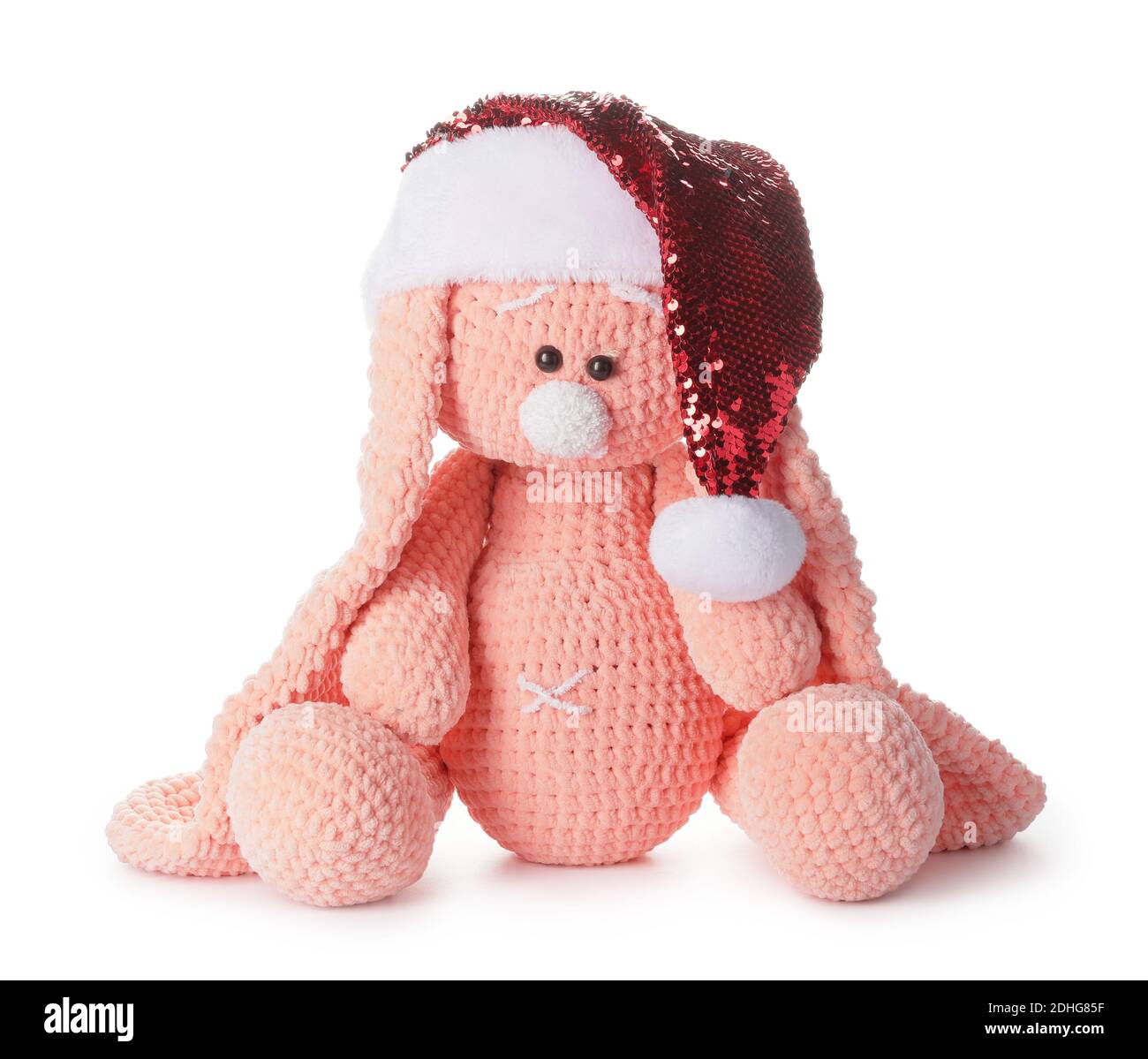 Santa hat with kid toy on white background Stock Photo - Alamy