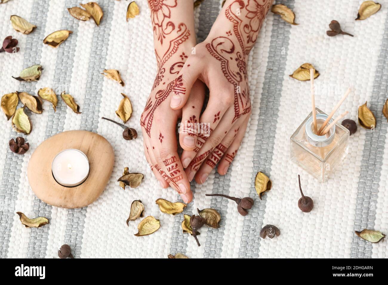 Beautiful female hands with henna tattoo, top view Stock Photo - Alamy