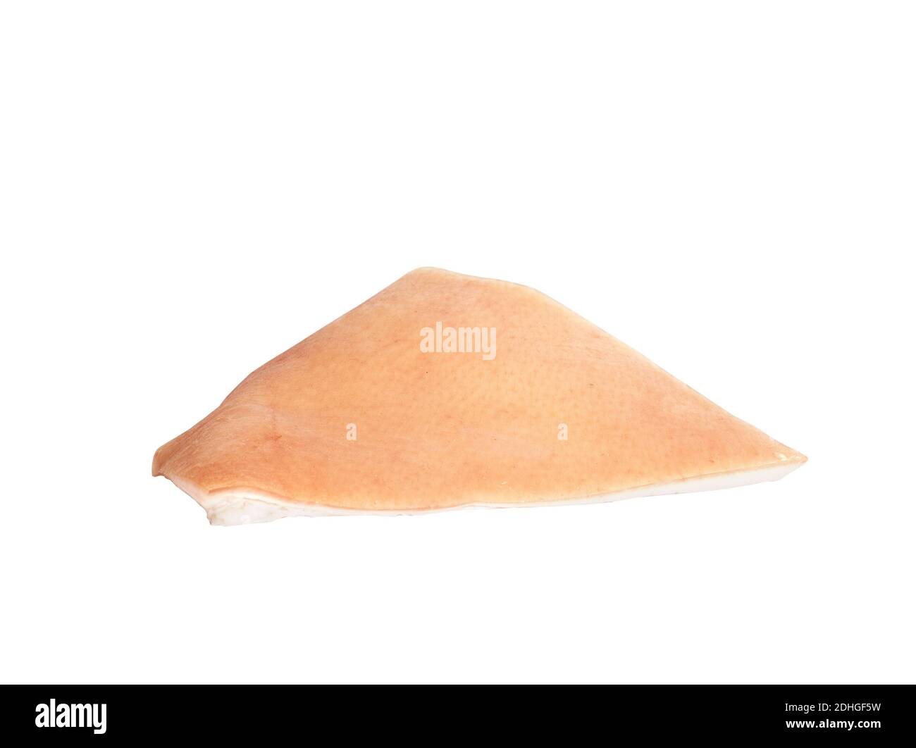 An isolated closeup of a stacked of raw pork skin on a white background ...