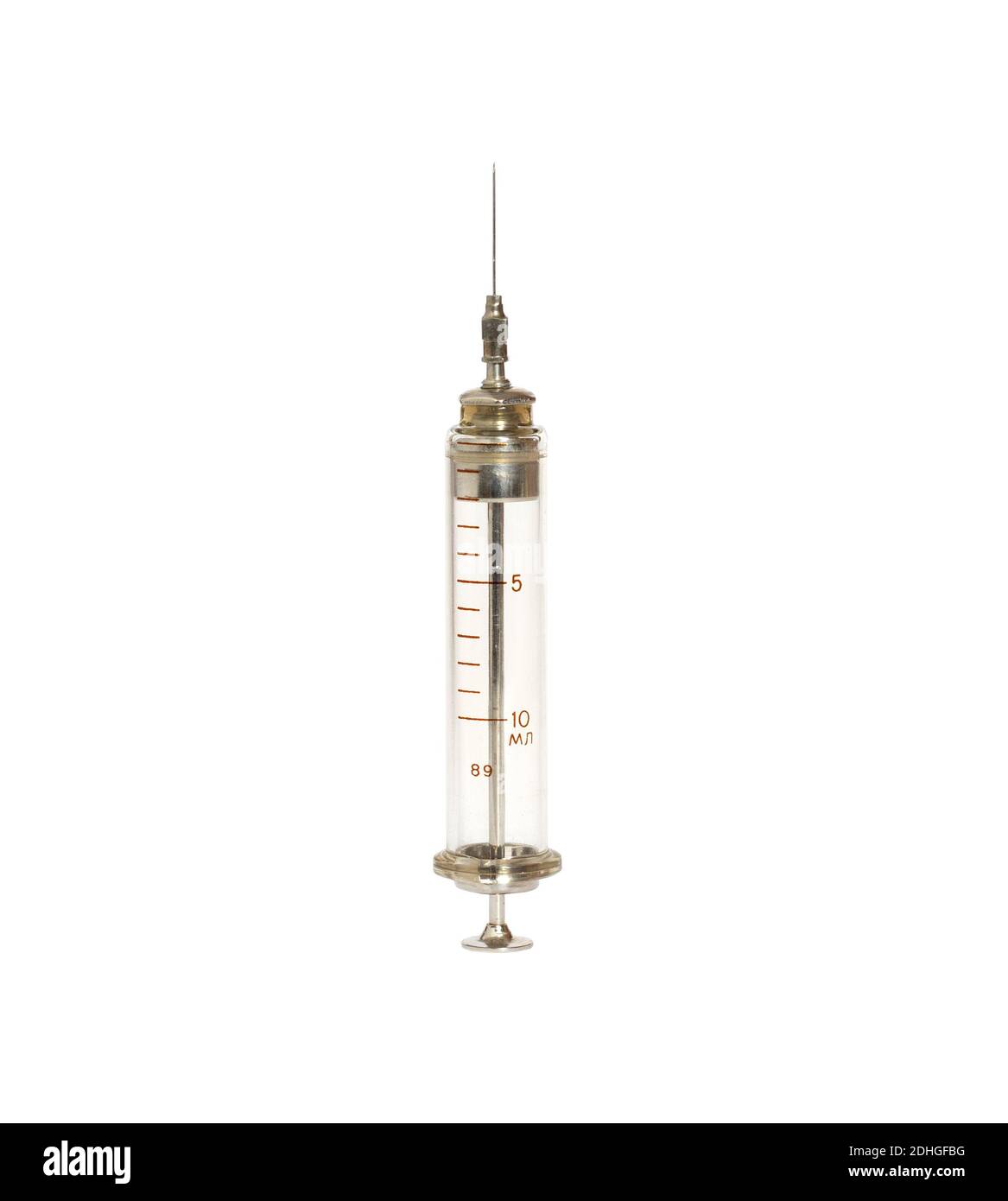 An isolated vertical closeup of an empty syringe on a white background ...