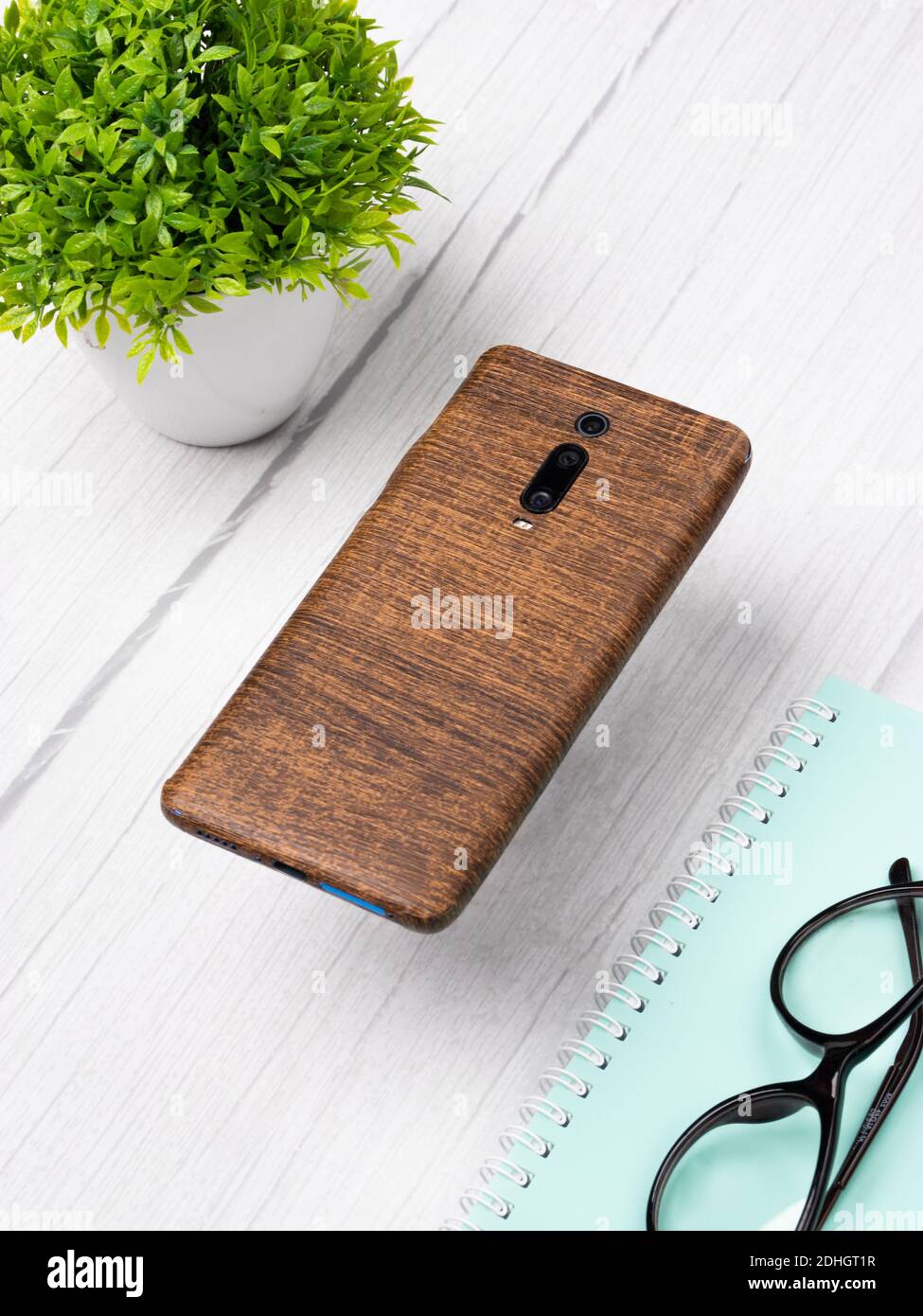 Custom phone skin flatlay with different background color Stock Photo ...