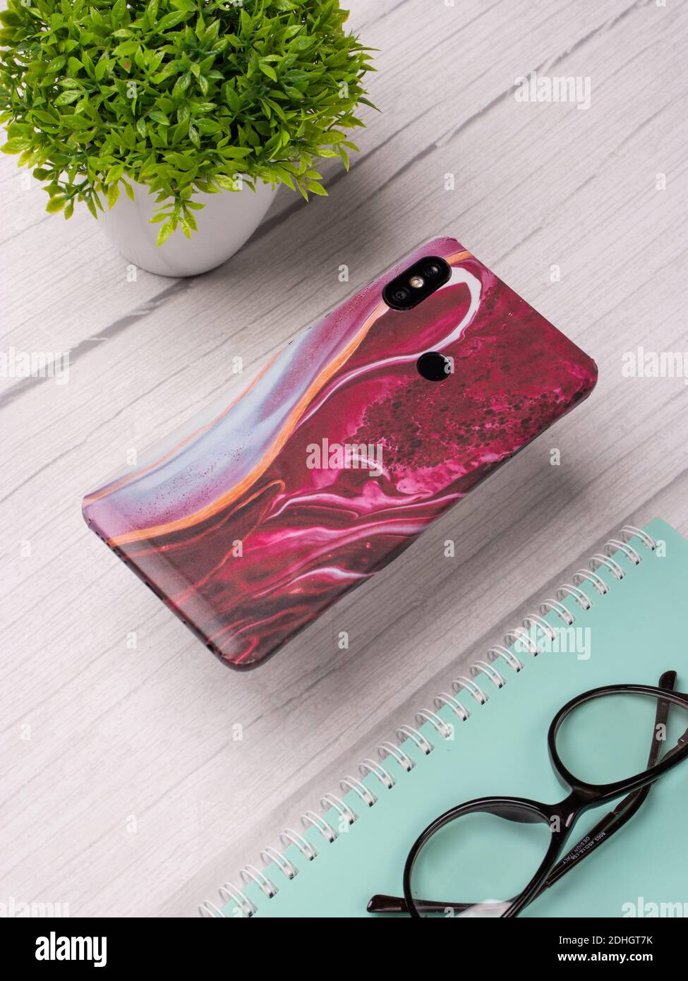 Custom phone skin flatlay with different background color Stock Photo ...