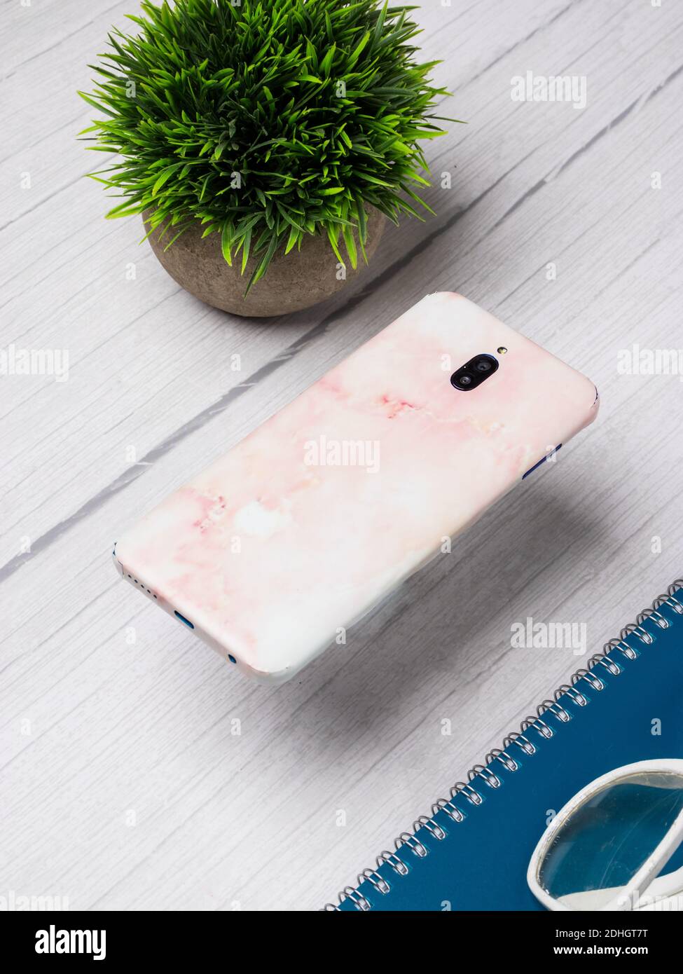 Custom phone skin flatlay with different background color Stock Photo ...