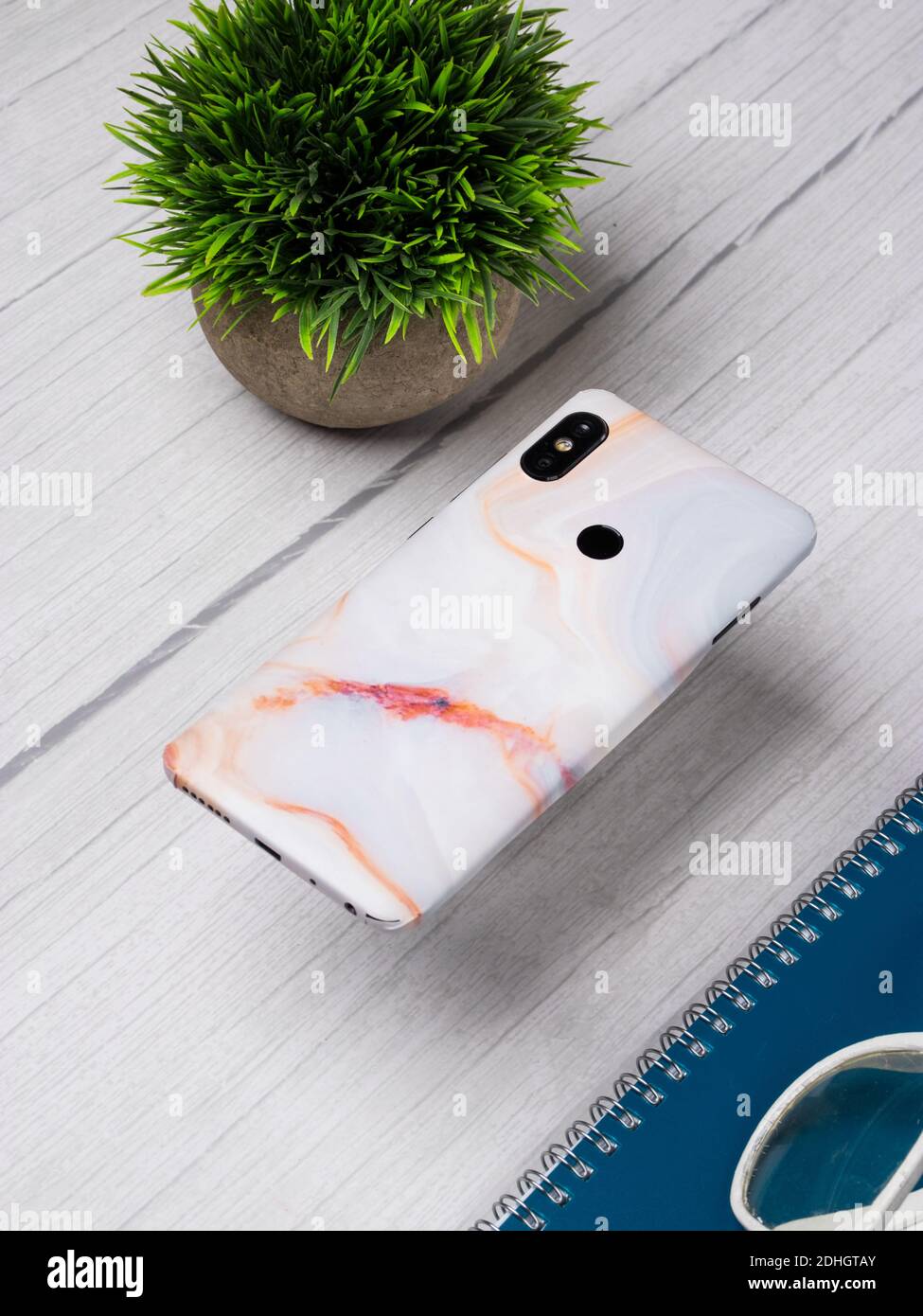 Custom phone skin flatlay with different background color Stock Photo ...