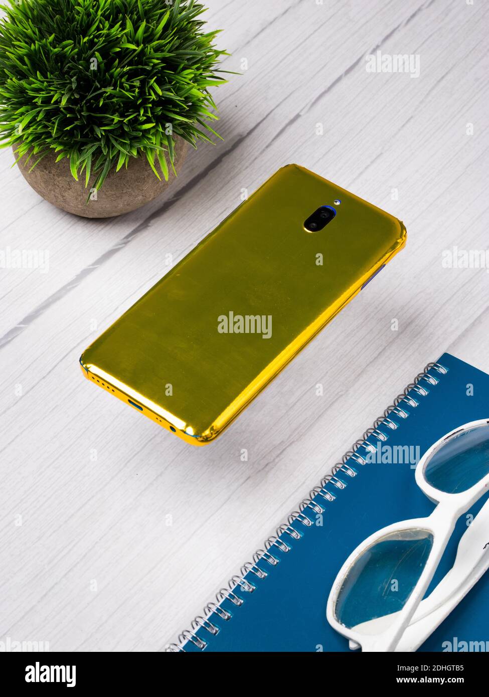 Custom phone skin flatlay with different background color Stock Photo ...