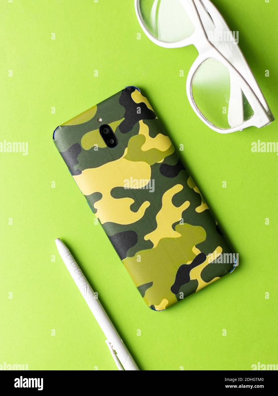 Custom phone skin flatlay with different background color Stock Photo ...