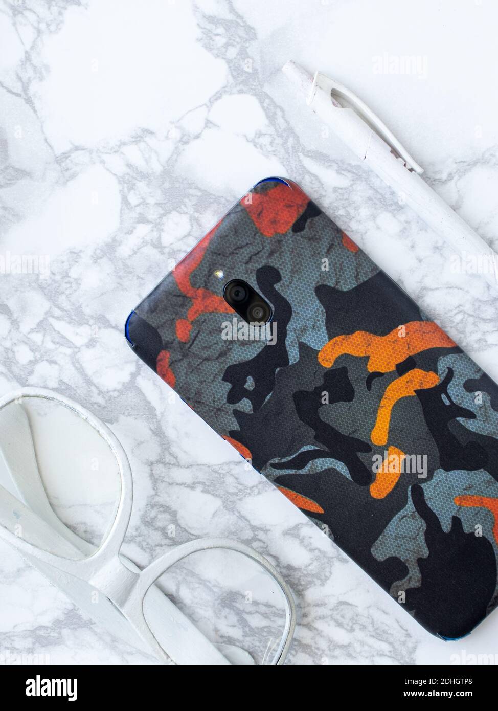 Custom phone skin flatlay with different background color Stock Photo ...