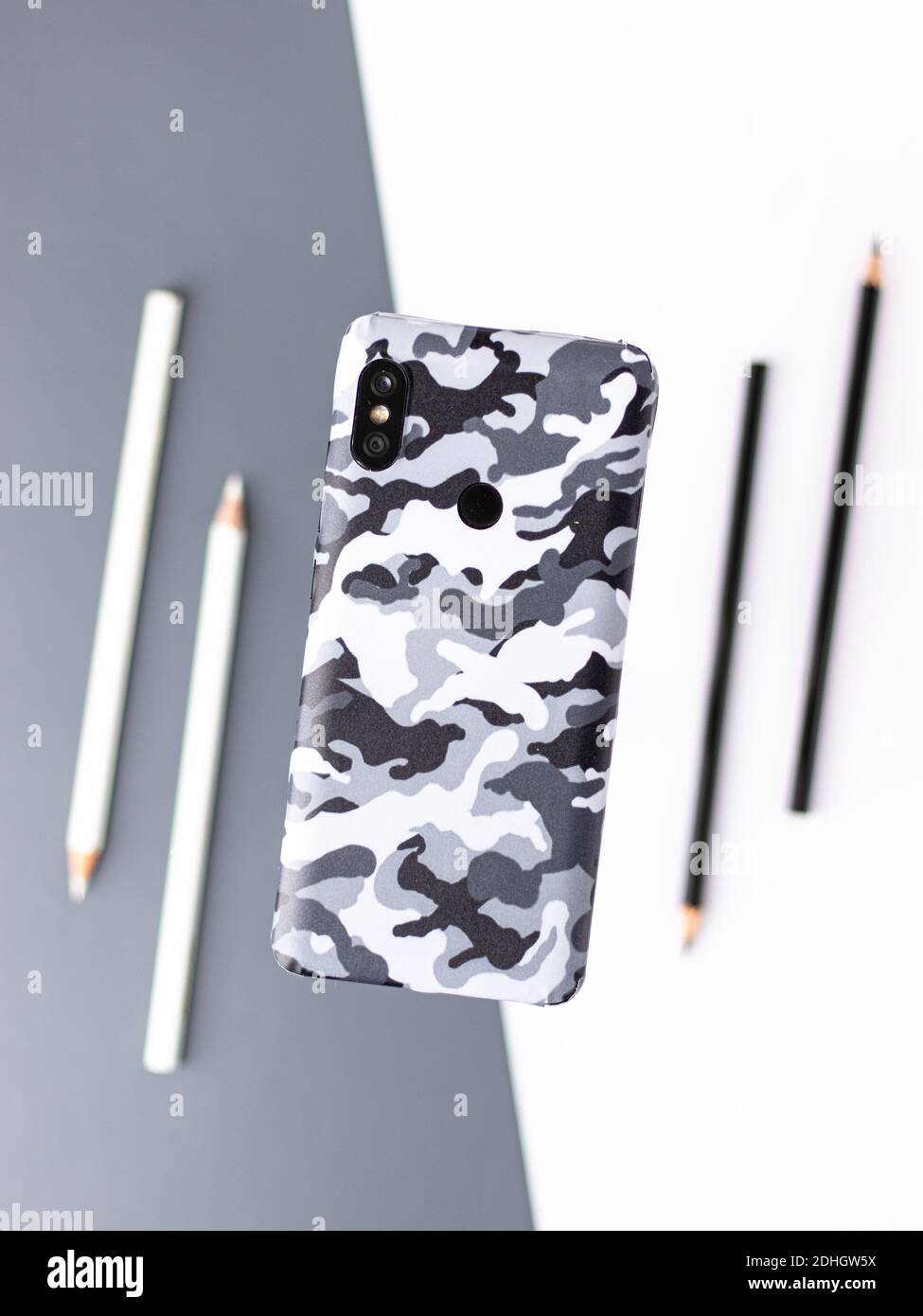Custom phone skin flatlay with different background color Stock Photo ...