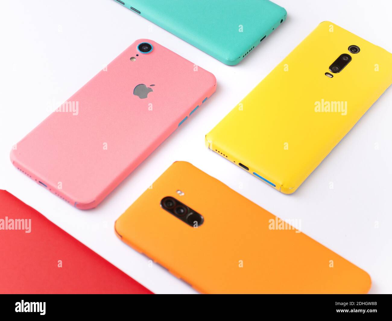 Custom phone skin flatlay with different background color Stock Photo ...