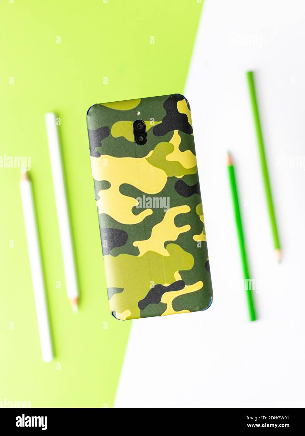 Custom phone skin flatlay with different background color Stock Photo ...