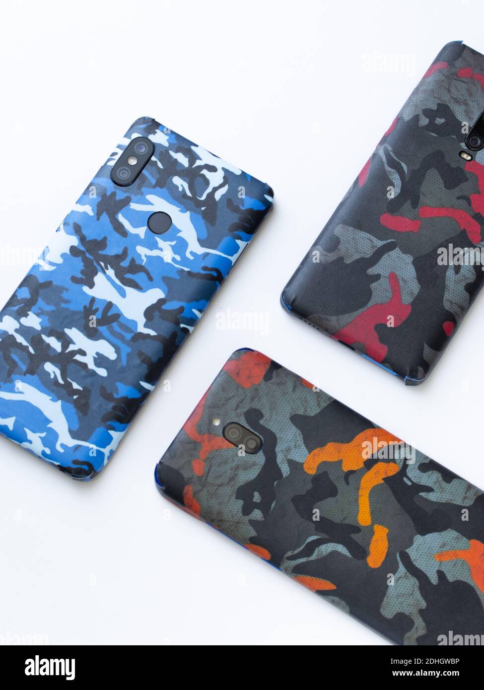 Custom phone skin flatlay with different background color Stock Photo ...